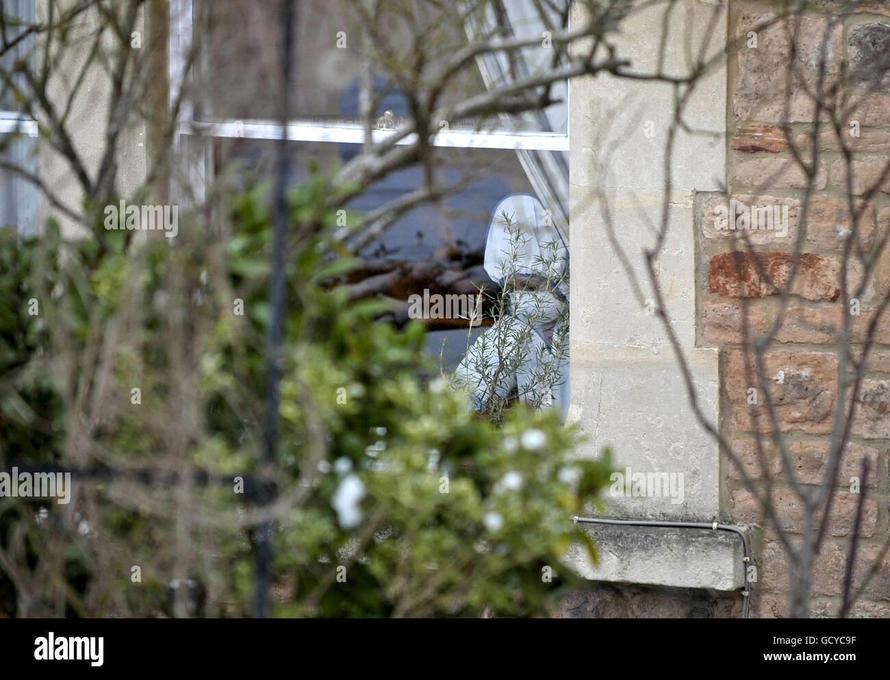 Forensic officers inside the ground floor flat in Clifton, Bristol ...