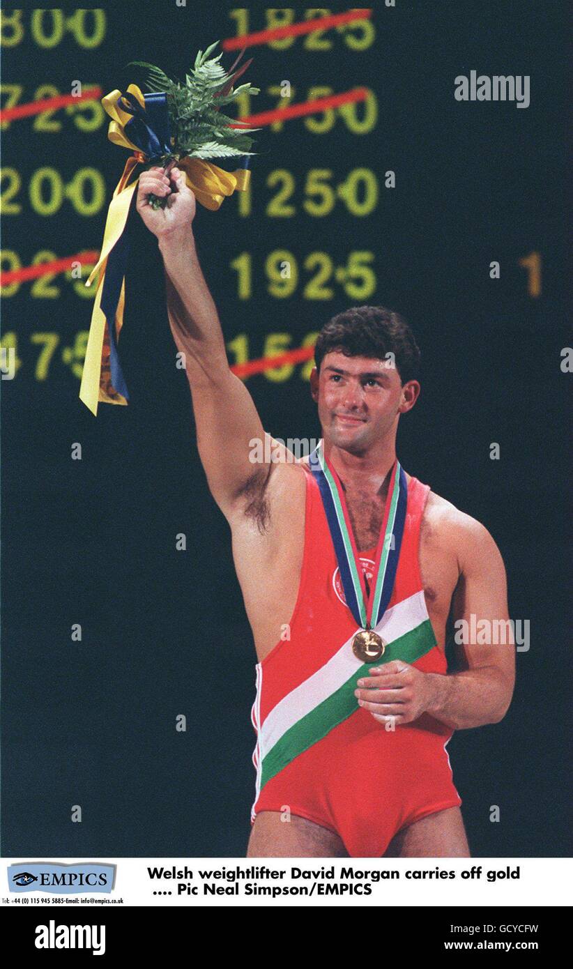 WELSH WEIGHTLIFTER DAVID MORGAN CARRIES OFF GOLD 1990 Stock Photo - Alamy