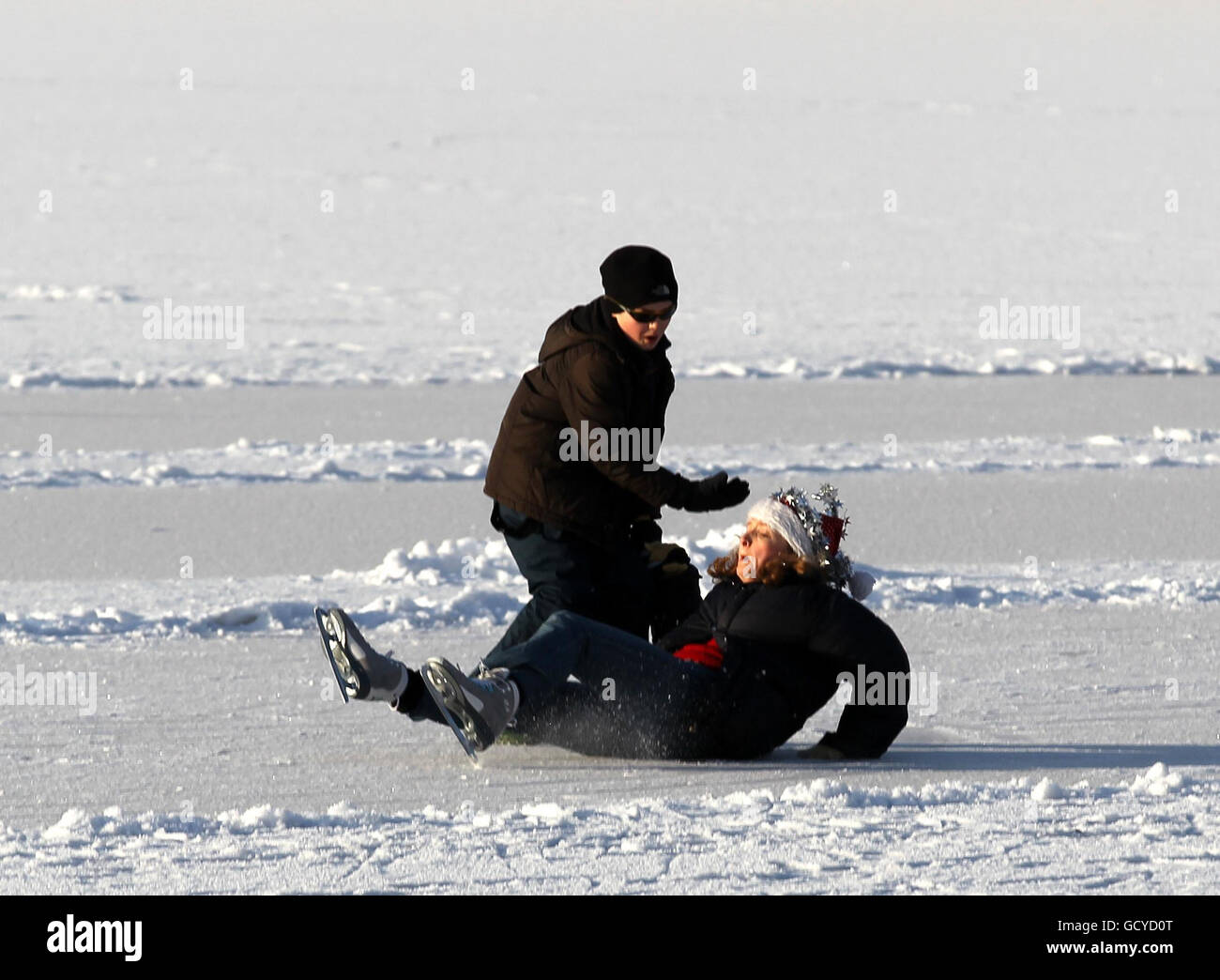 Christmas 2010. Becky Saunders takes a tumble whilst ice skating with ...
