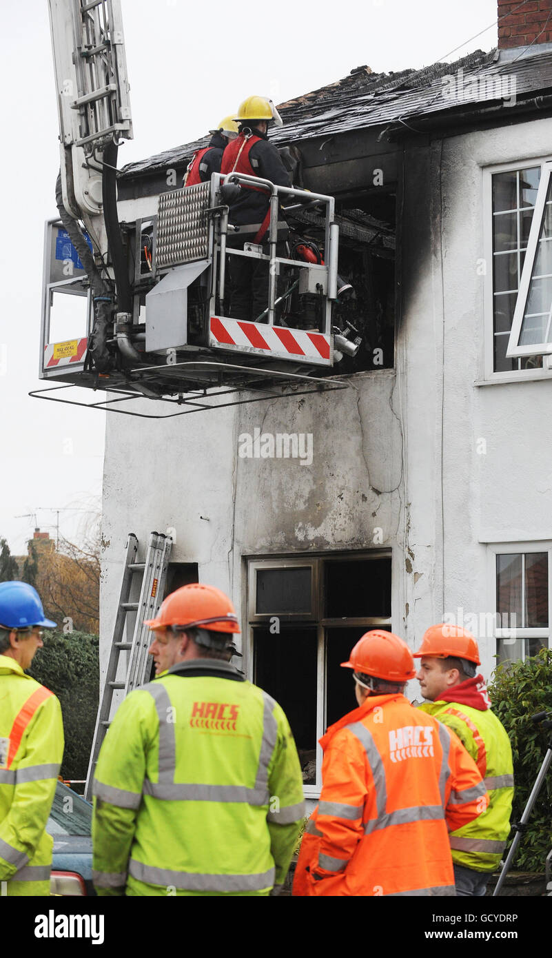 Firefighters at the scene of house fire in birch grove hi-res stock ...