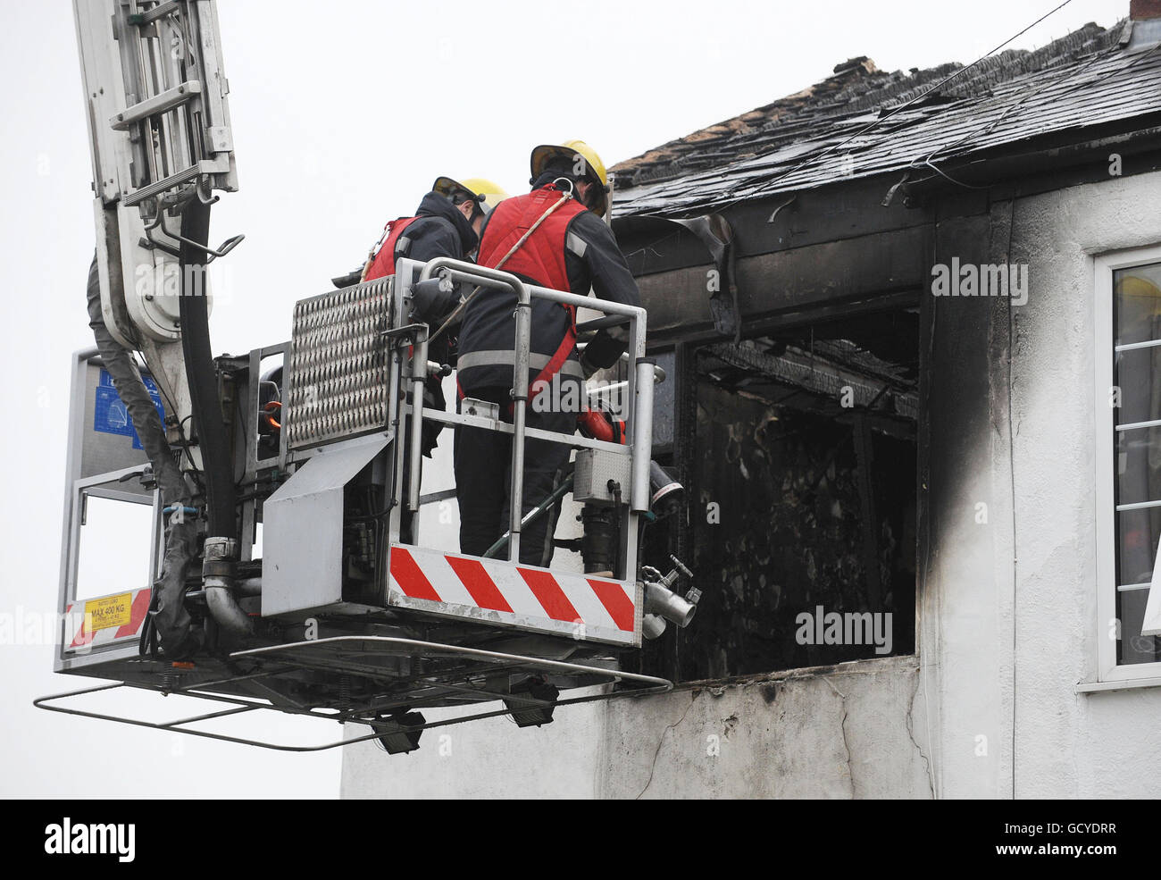 Firefighters at the scene of house fire in birch grove hi-res stock ...