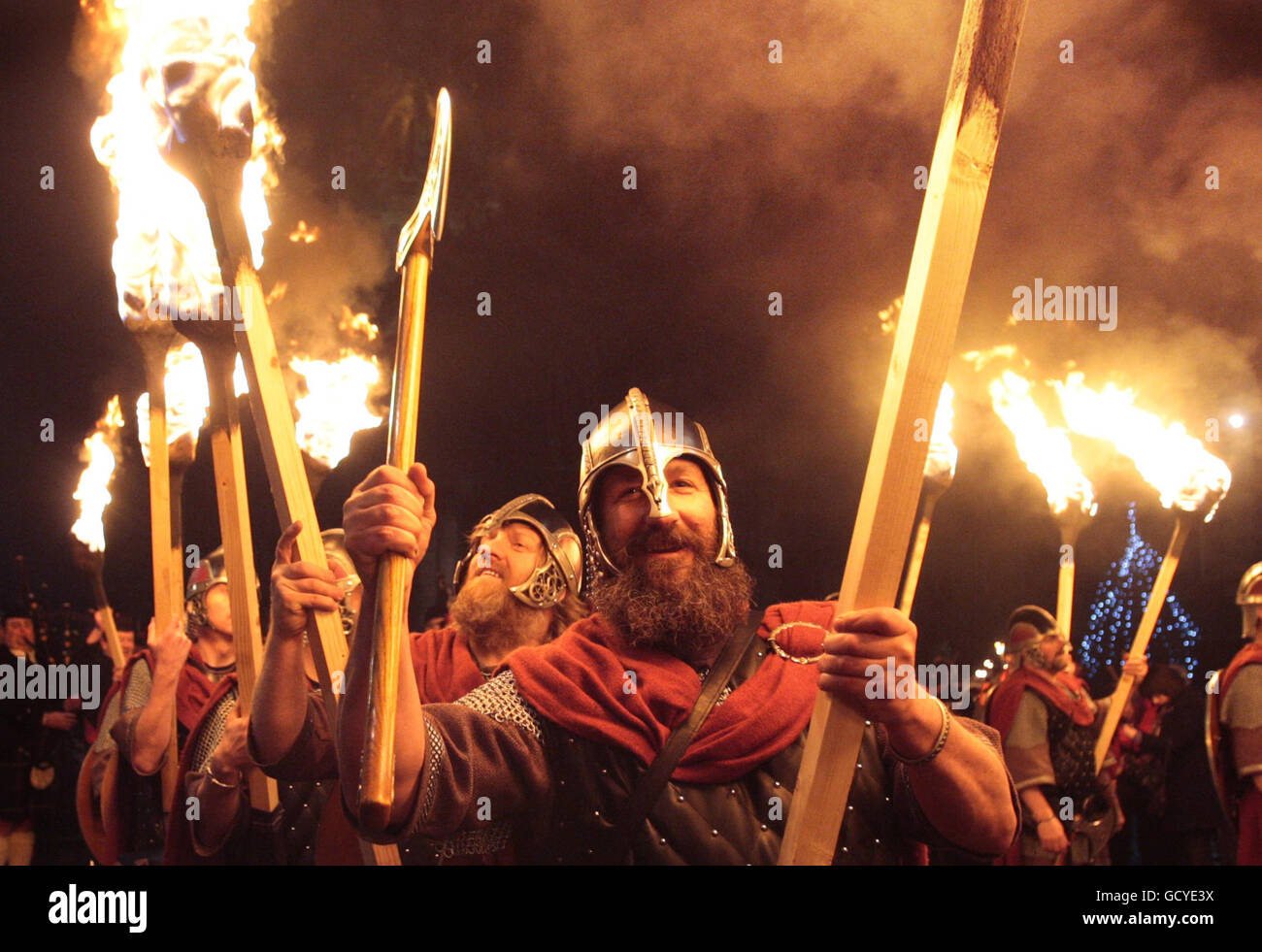 Torch carriers proceed up Edinburgh's Royal Mile to Calton Hill ...