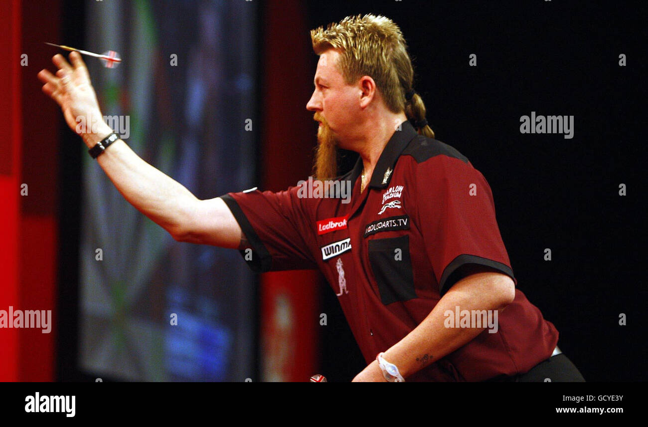 Simon Whitlock in action against Vincent van der Voort during the ...