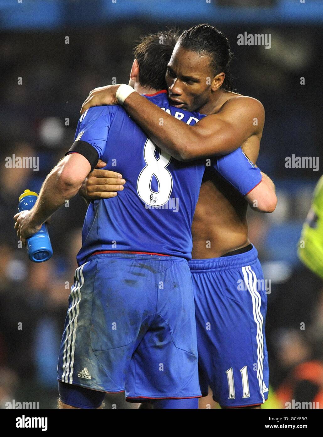 Chelsea's Frank Lampard (left) and Didier Drogba celebrate victory ...
