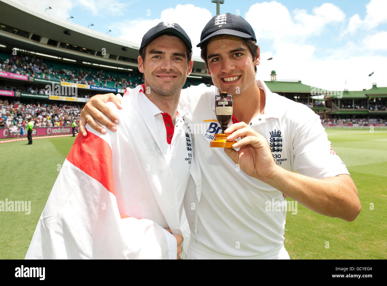 England's James Anderson and Alastair Cook celebrate winning the fifth ...