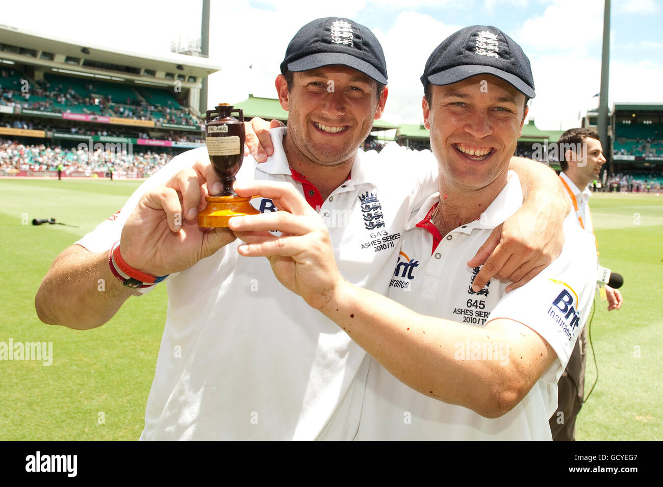 England's Tim Bresnan and Jonathan Trott celebrate winning the fifth ...
