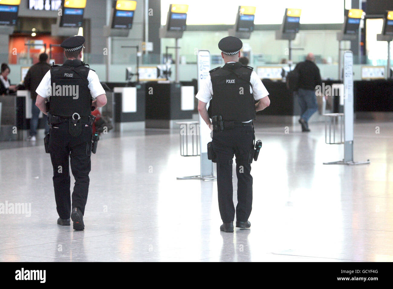 Armed police officers on patrol at Heathrow Airport's Terminal 5, as ...
