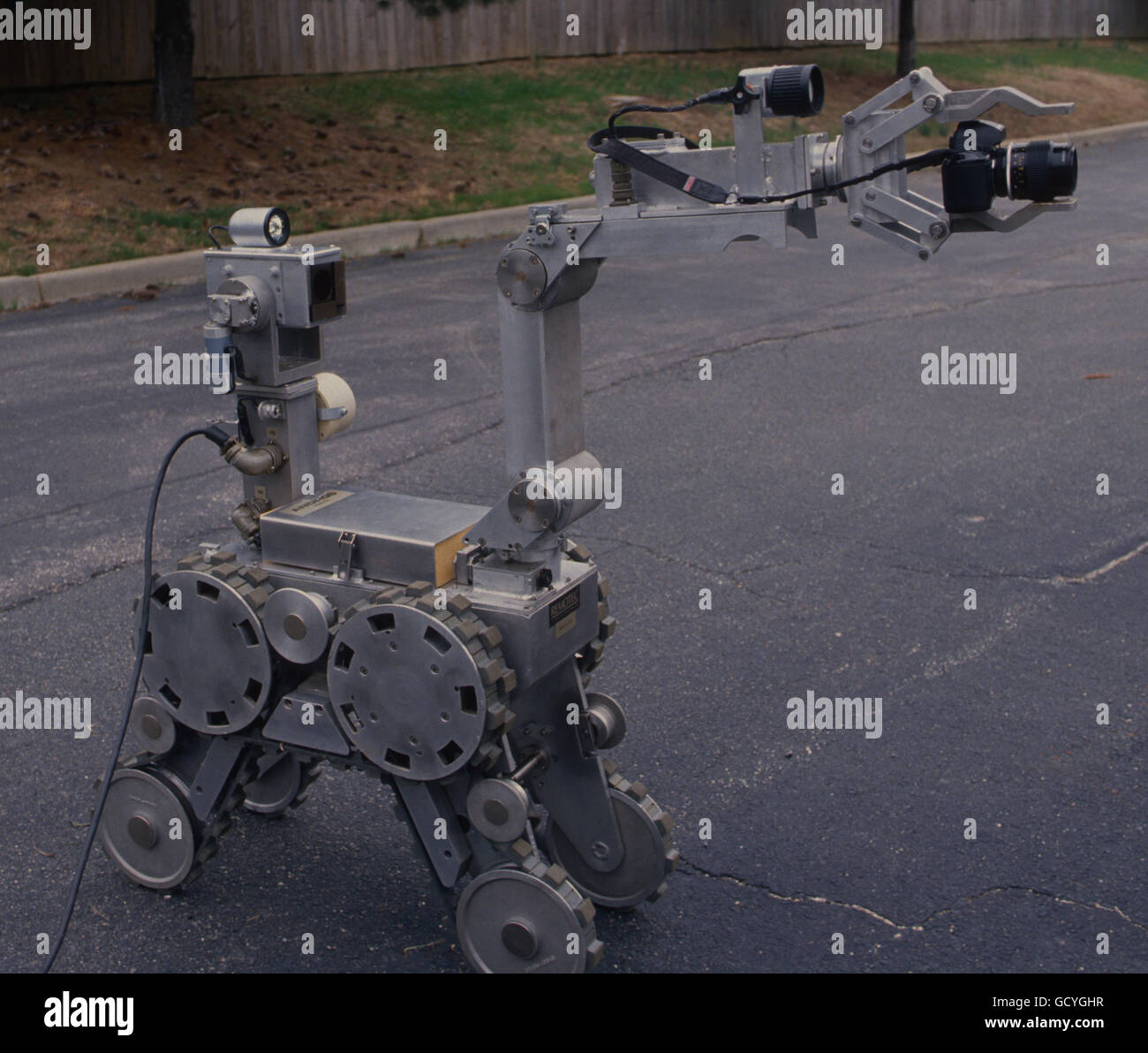 Bomb disposal robot equiped with rotating grips and can climb steps and ...