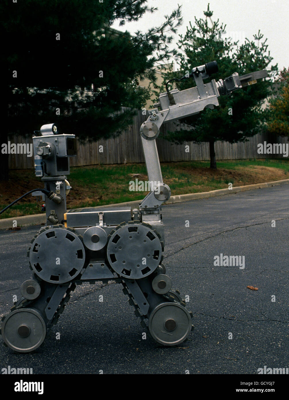 Bomb disposal robot equiped with rotating grips and can climb steps and ...