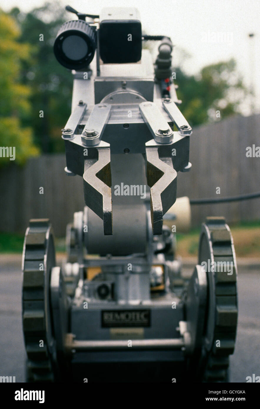Bomb disposal robot equiped with rotating grips and can climb steps and ...