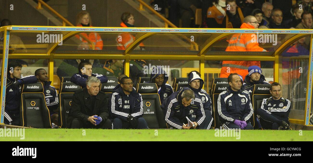 Chelsea manager Carlo Ancelotti (left) watches from the bench Stock ...