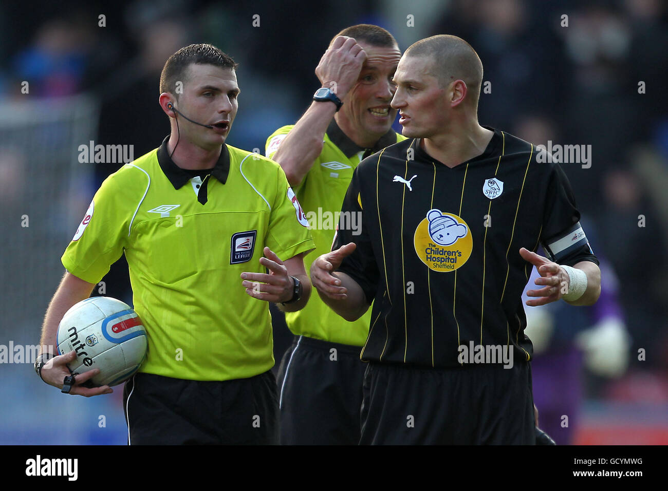 Football referee talking player hi-res stock photography and images - Alamy