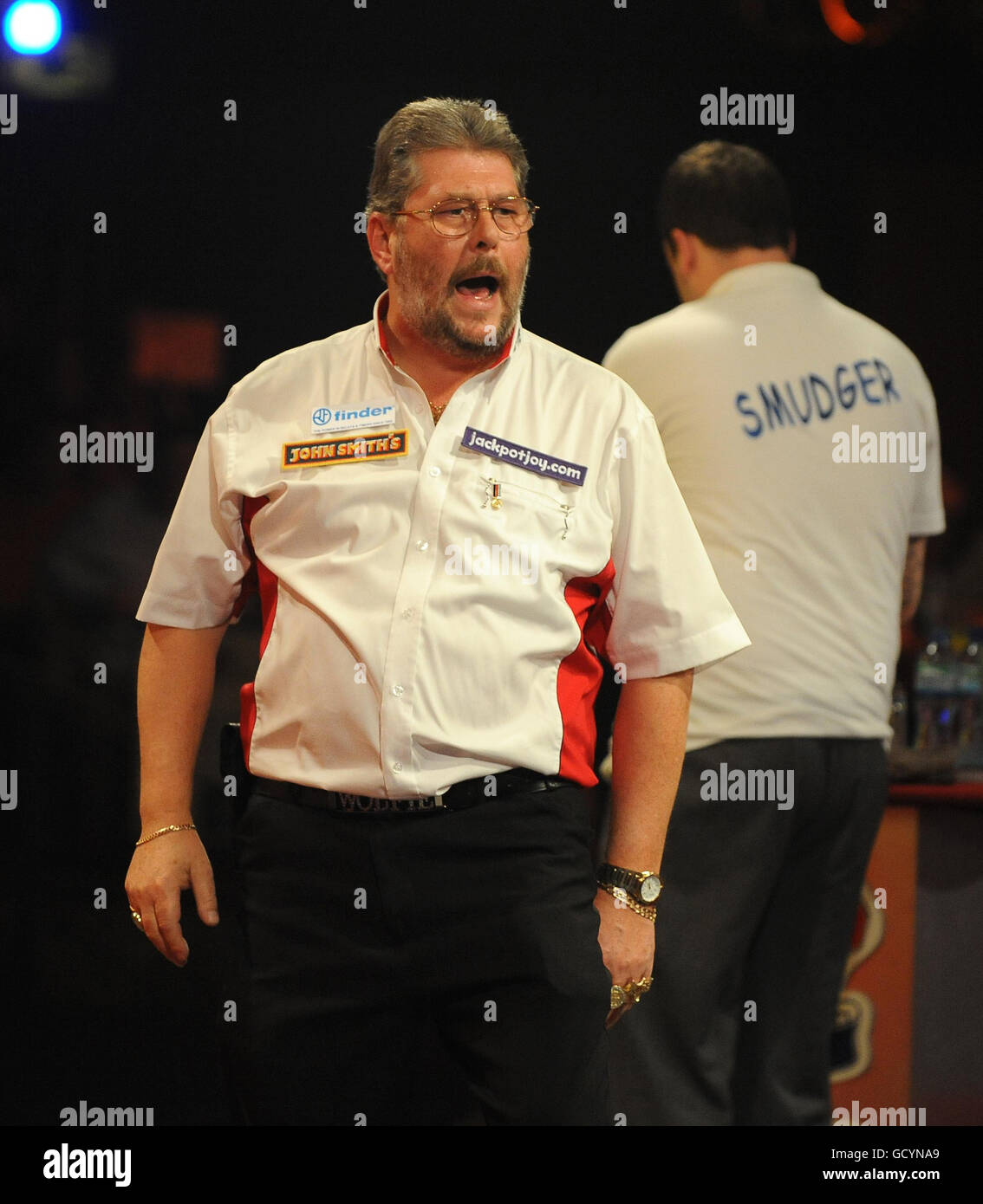 England's Martin Adams (left) celebrates beating England's Ross Smith ...