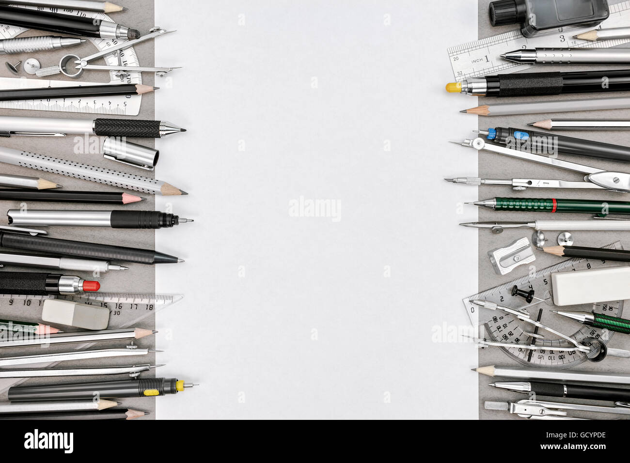 top view of empty paper sheet and various drawing tools and artist ...