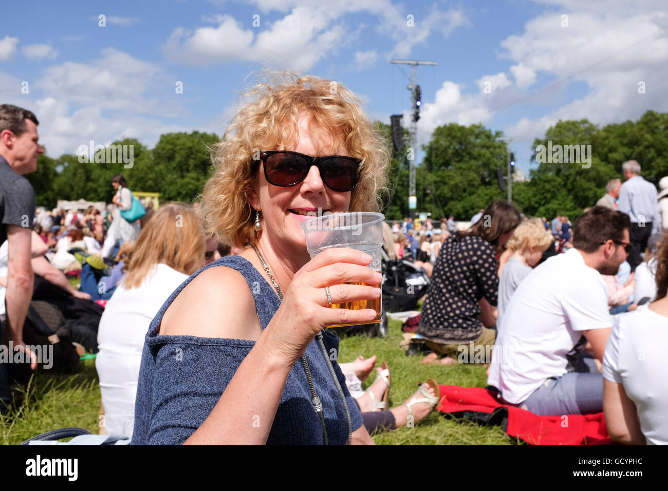 Woman pint beer crowd hi-res stock photography and images - Alamy
