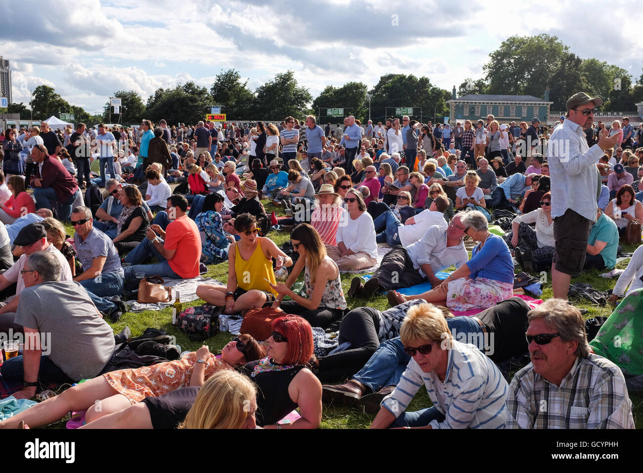 Crowds enjoying summer weather at Hyde Park concert London UK Stock ...