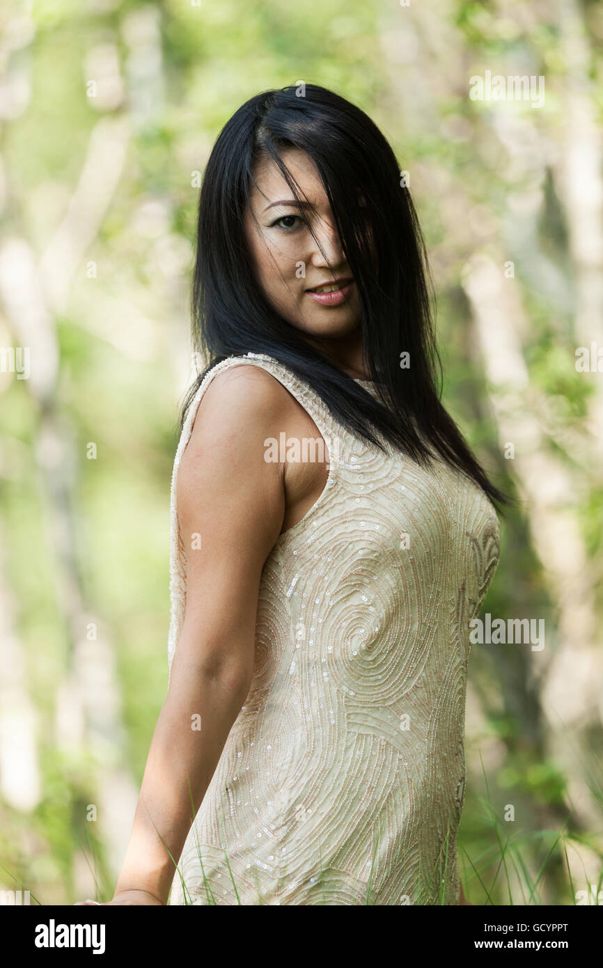 Elegant asian woman in the forest Stock Photo - Alamy