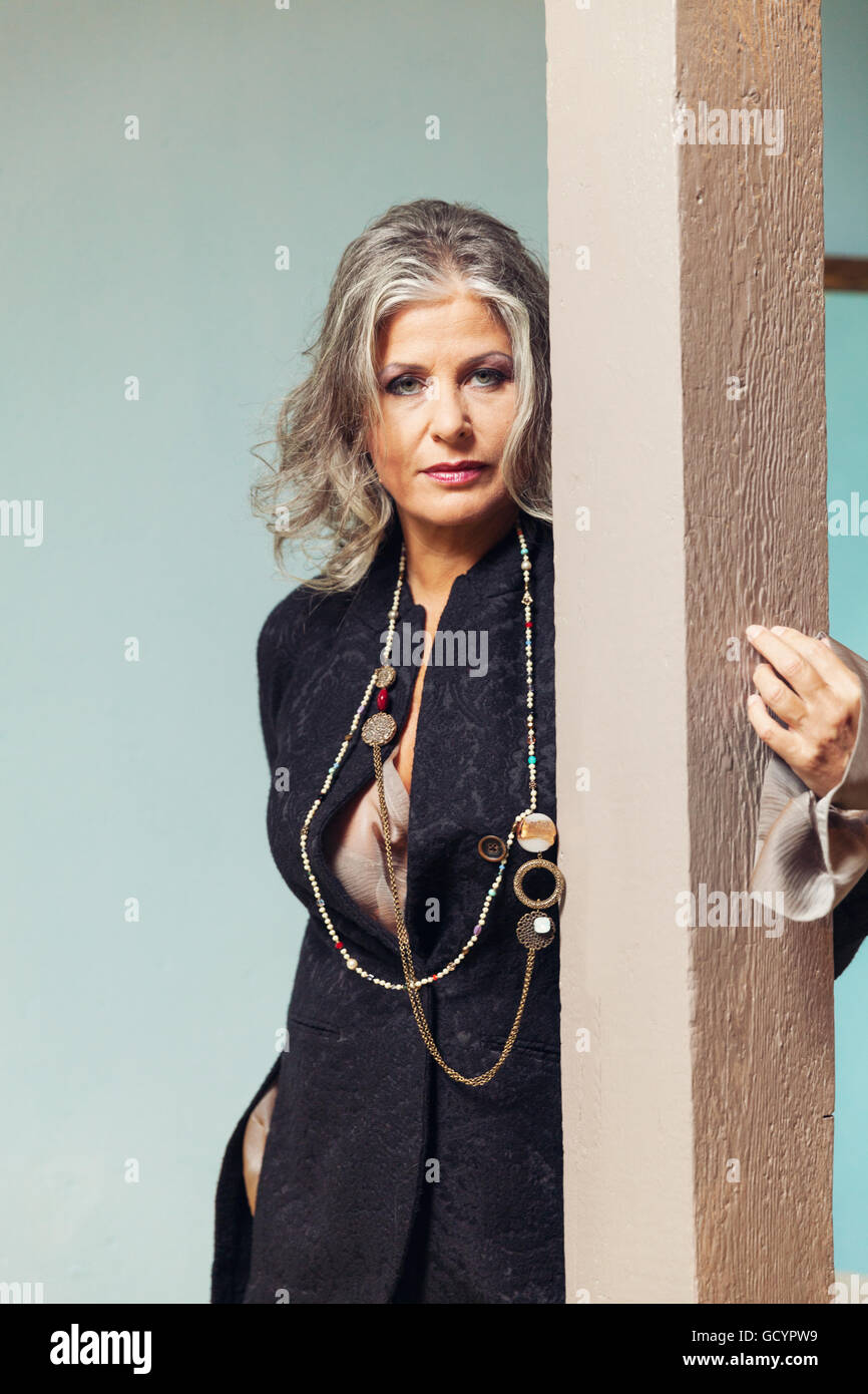 Elegant woman in interior Stock Photo - Alamy