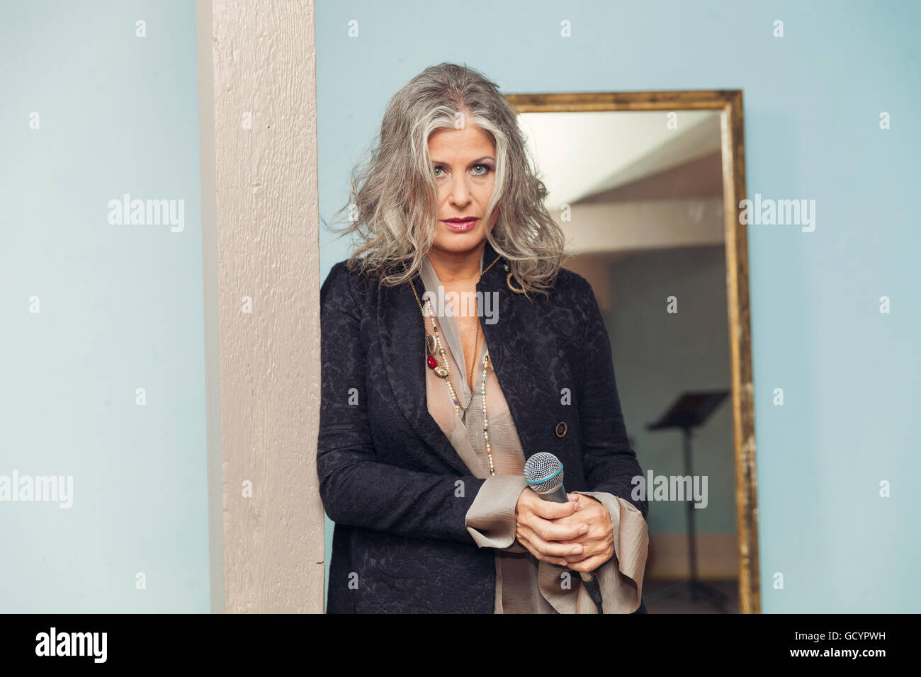 Portrait in interior, singer Stock Photo - Alamy