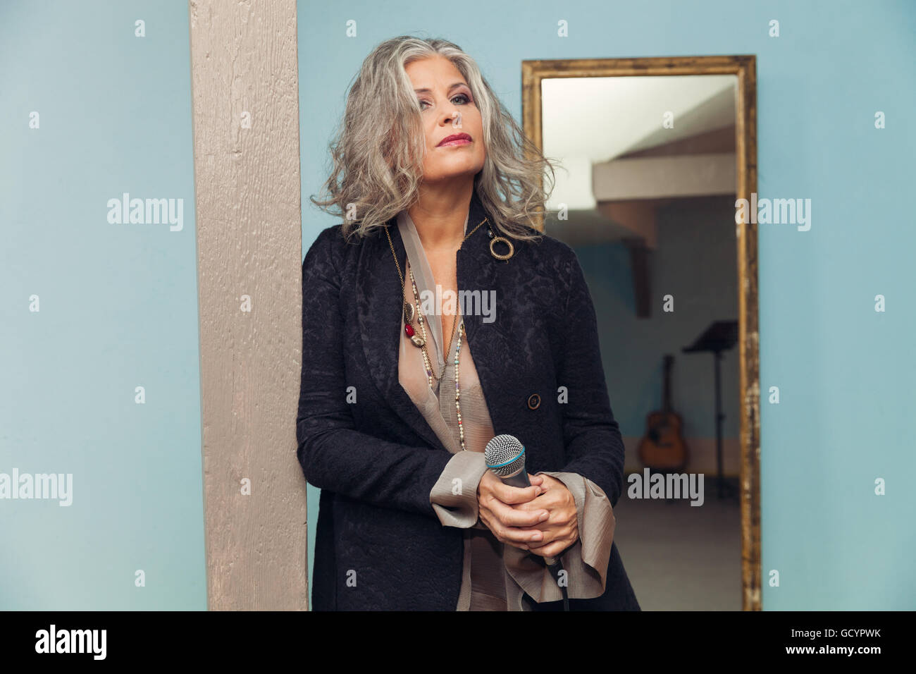 Portrait in interior, singer Stock Photo - Alamy