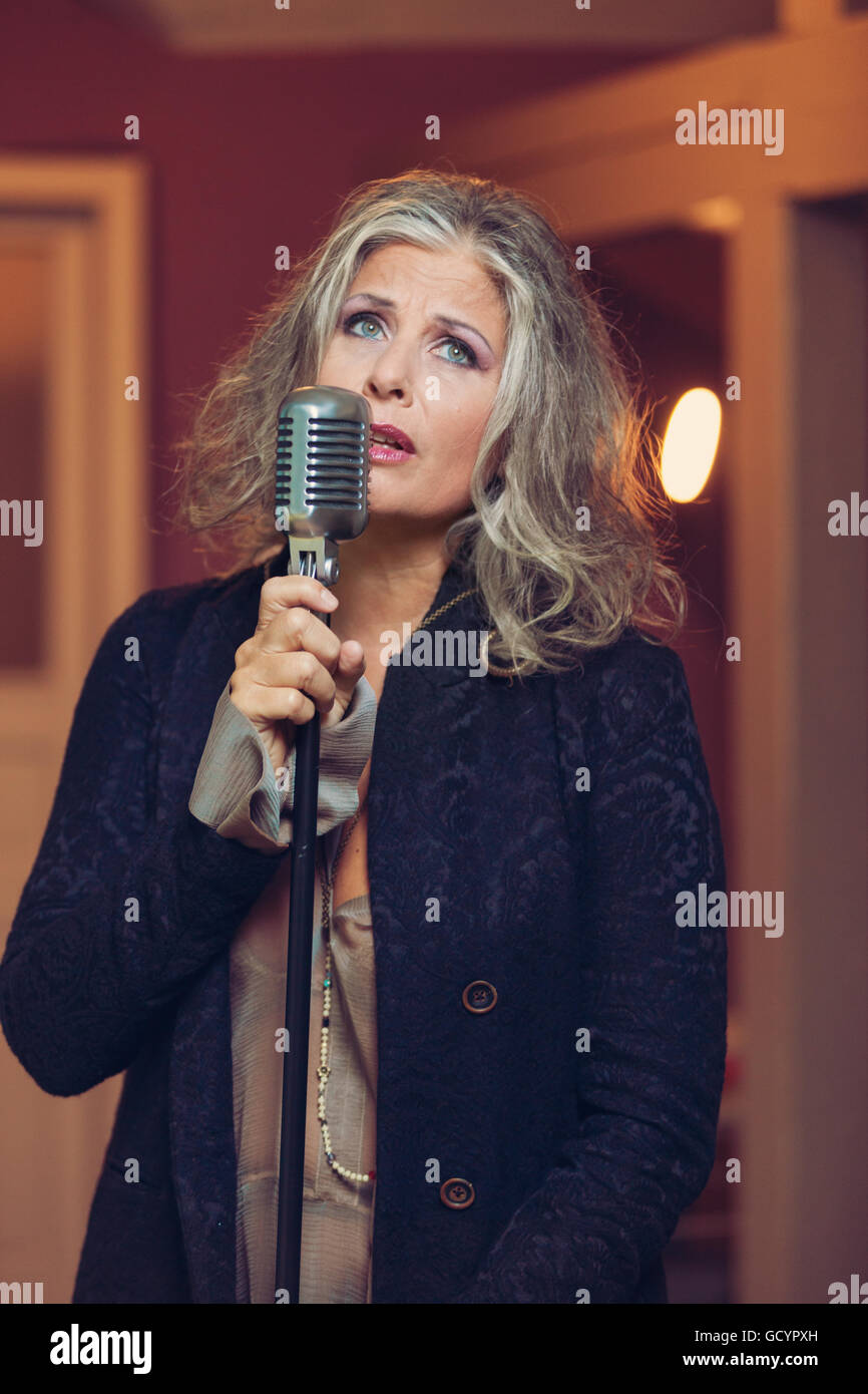 Portrait in interior, singer Stock Photo - Alamy