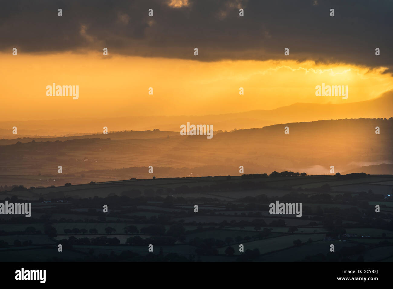 Sunset in Cornish fields with beautiful golden orange sky and cloud ...