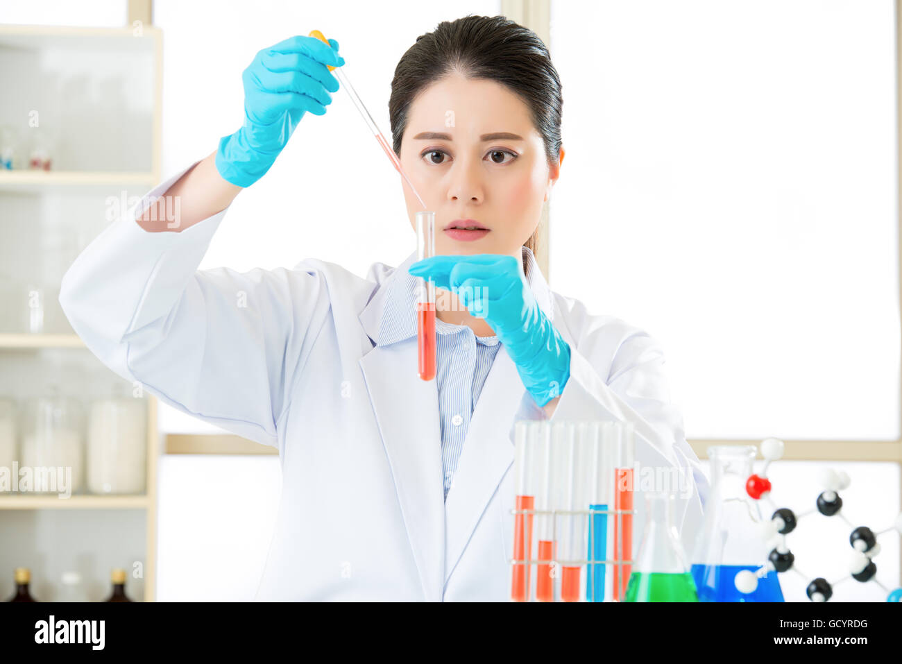 Asian female forensic scientist working hi-res stock photography and ...