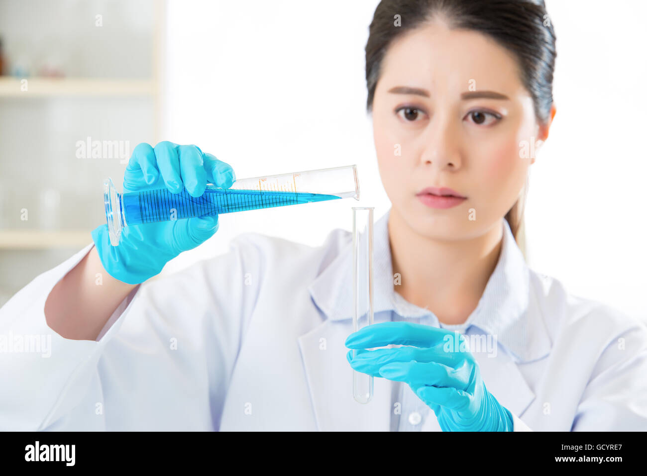 Asian female scientist Researcher observing indicator color shift in ...
