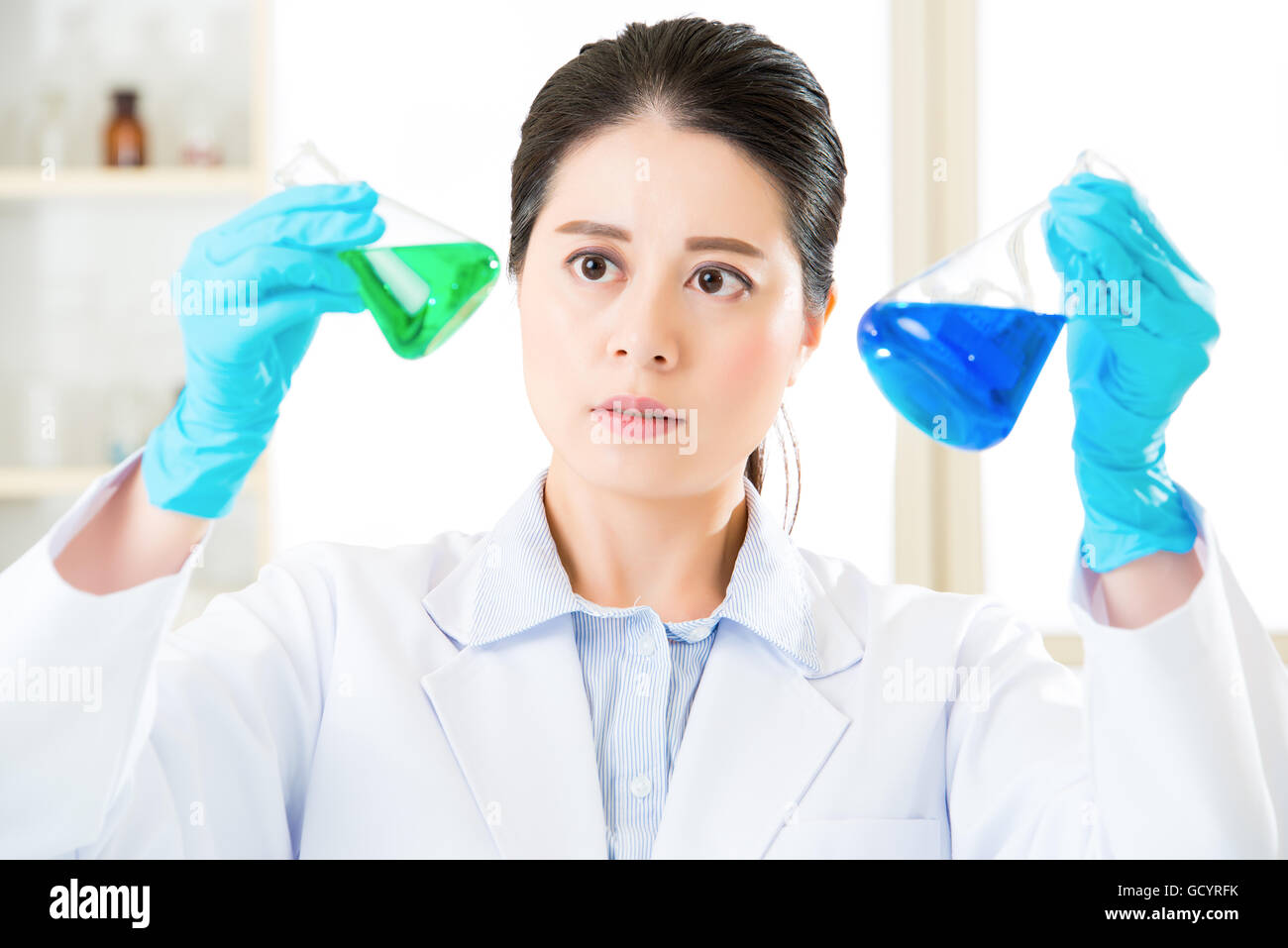 asian female scientist Researcher observing indicator color shift in ...