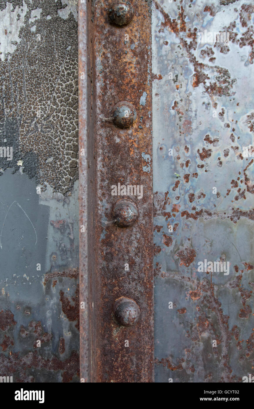 Rusted Rivets in Angle Iron background image Stock Photo - Alamy