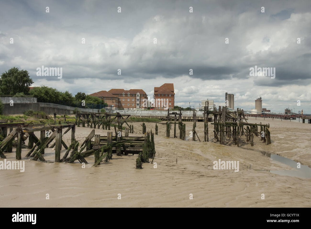 Derelict decaying ramshackle old pier sign of decreased river trade ...