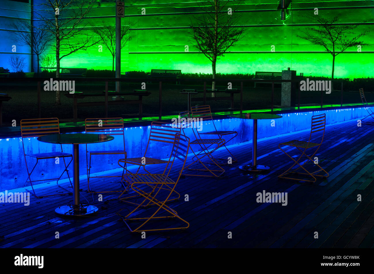 Downtown Seattle park at night with bright blue and green colors and ...