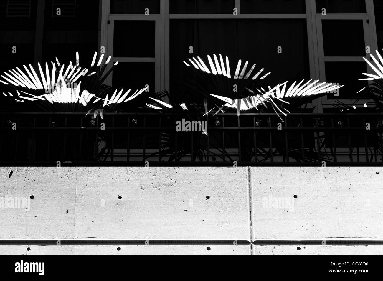 Downtown park at night with abstract sculpture Stock Photo - Alamy