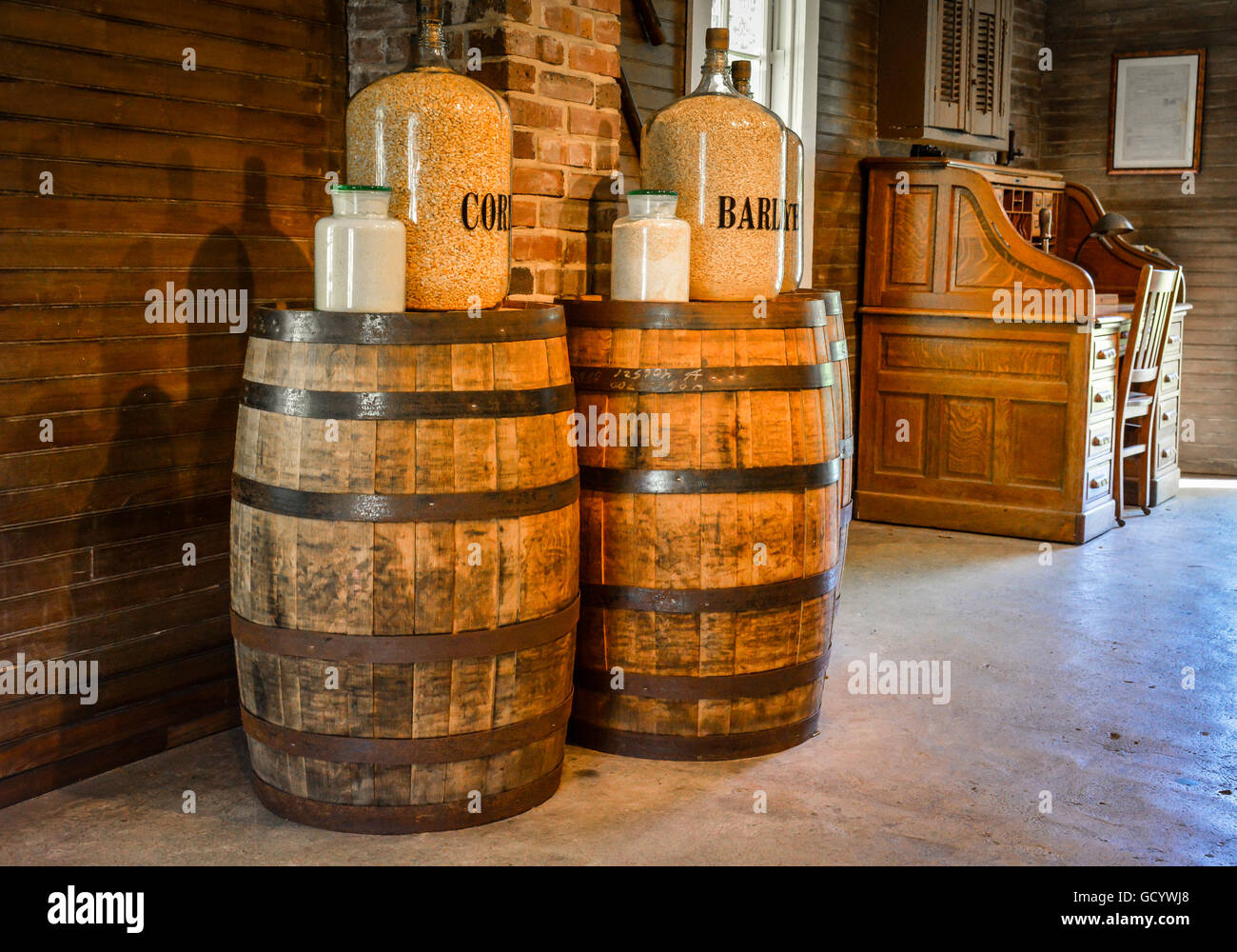 Corn & Barley jugs atop two authentic, aged oak barrels with metal ...