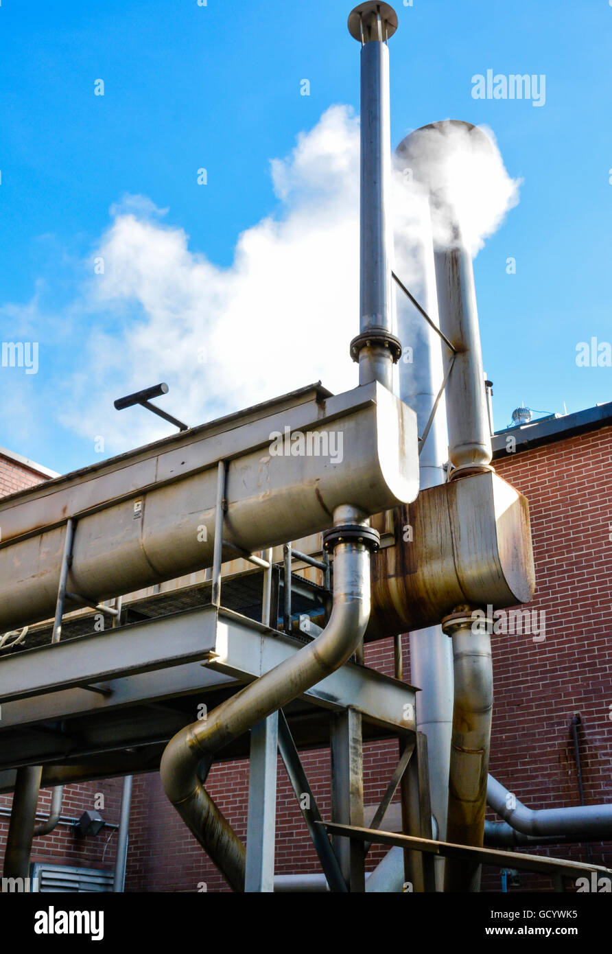 White steam rises around the processing facilities at the Jack Daniel's ...