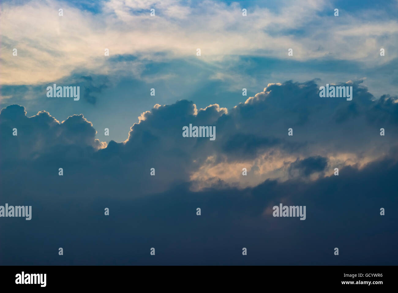 Formation of clouds with the sun reflecting on the other side Stock ...