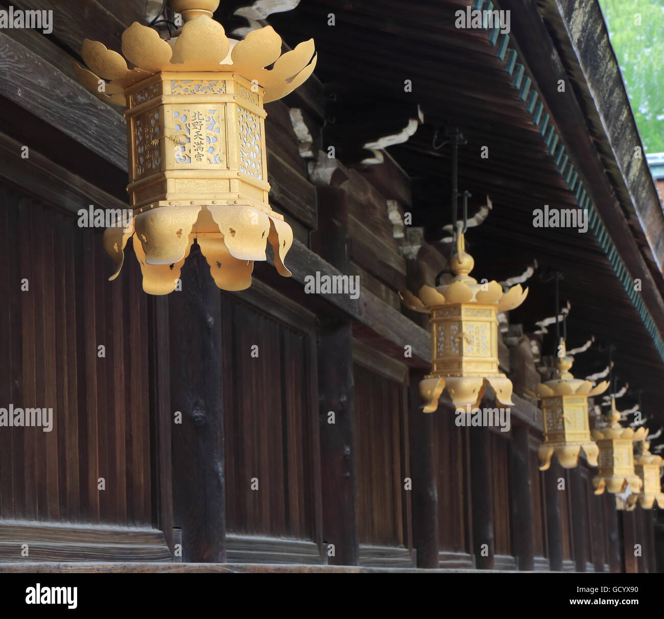 Golden lantern in Kitano Tenmangu shrine in Kyoto Japan Stock Photo - Alamy