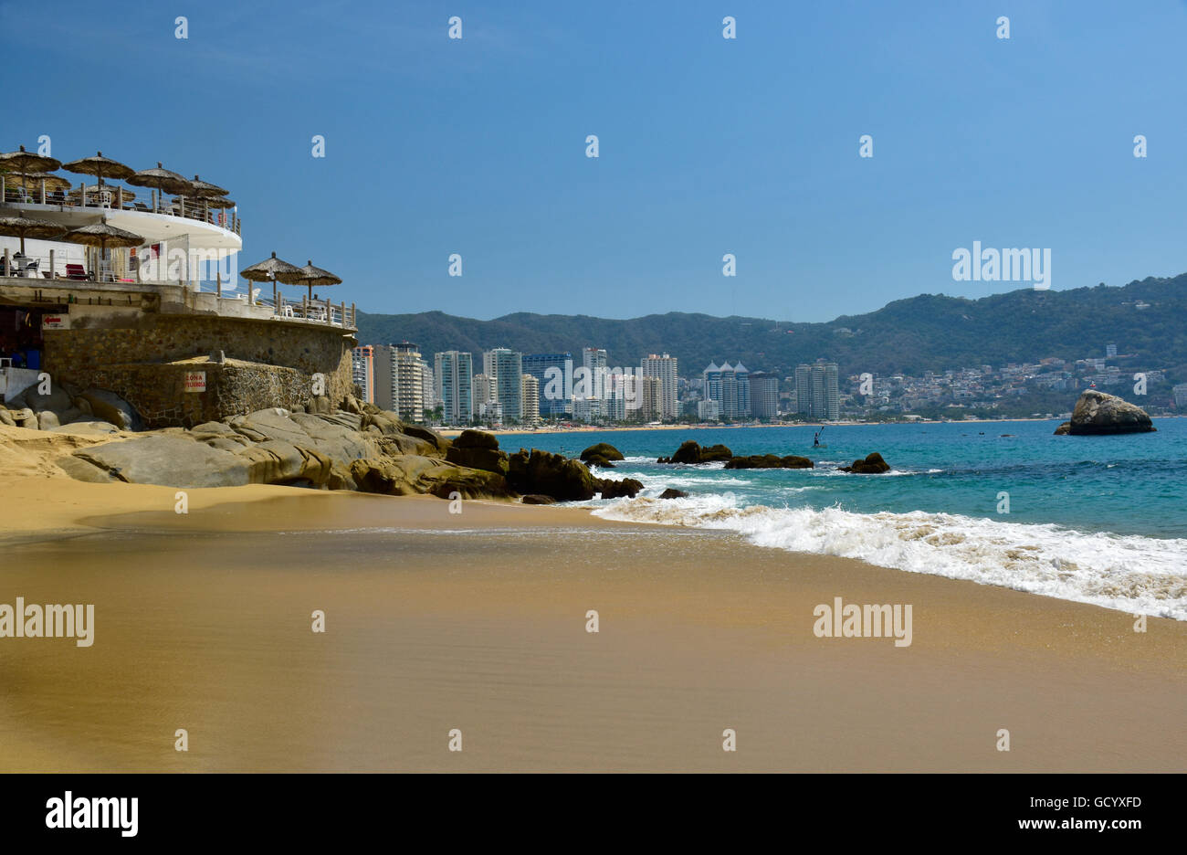 Pacific Ocean in Acapulco Bay and skyline of Acapulco, Mexico Stock ...