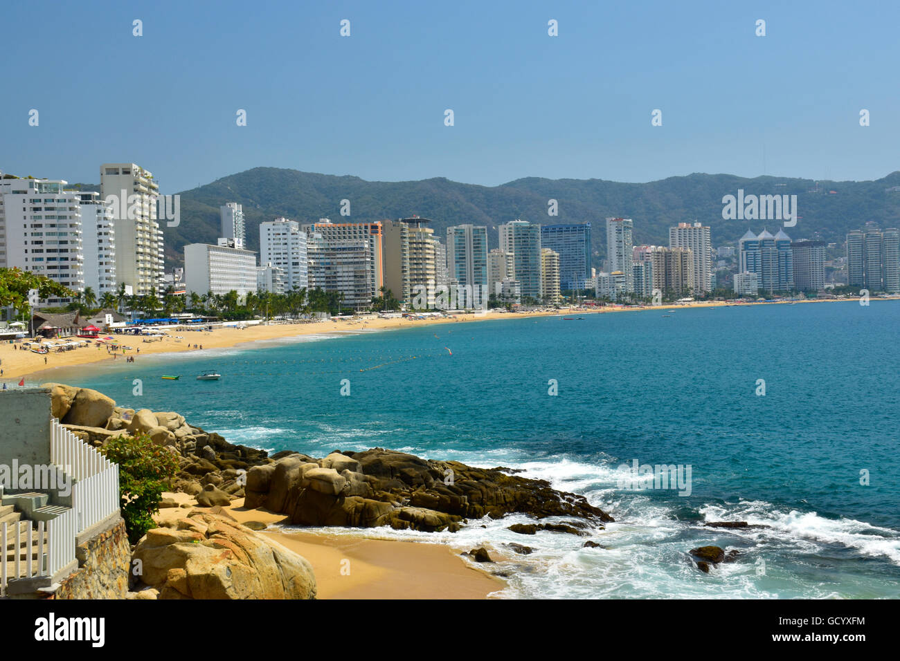 Pacific Ocean in Acapulco Bay and skyline of Acapulco, Mexico Stock ...