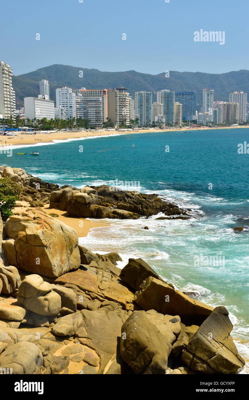 Pacific Ocean in Acapulco Bay and skyline of Acapulco, Mexico Stock ...