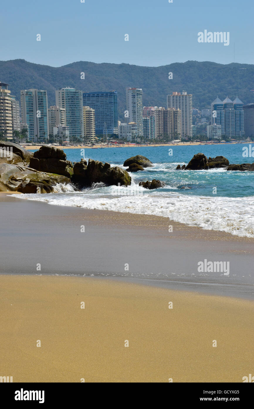 Pacific Ocean in Acapulco Bay and skyline of Acapulco, Mexico Stock ...