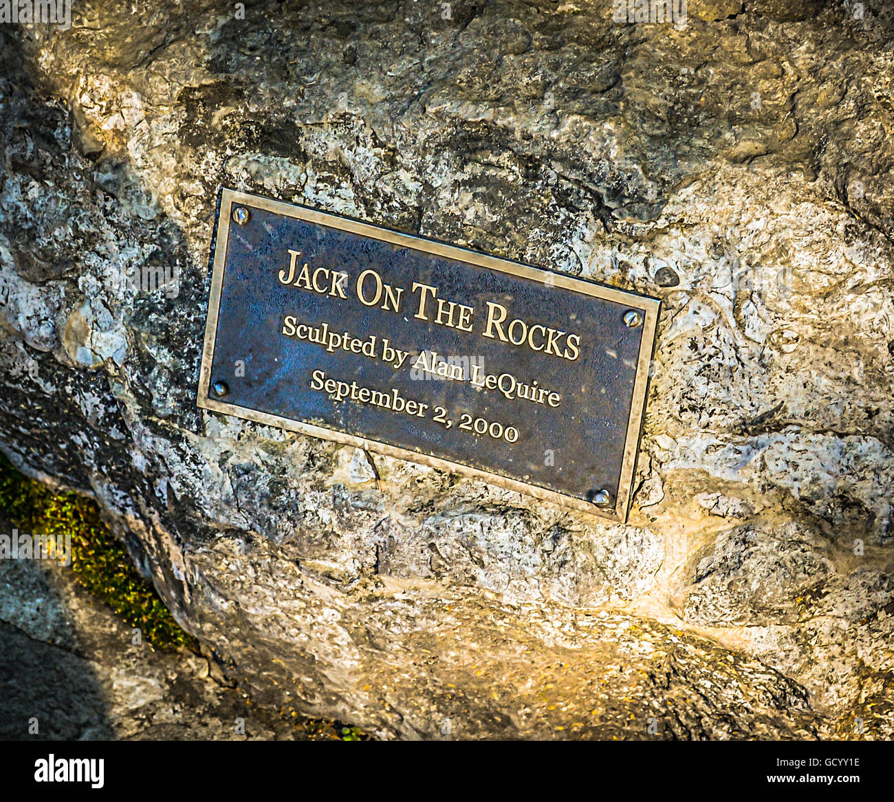 A plaque for the bronze Statue of Jack Daniel on the grounds of the ...
