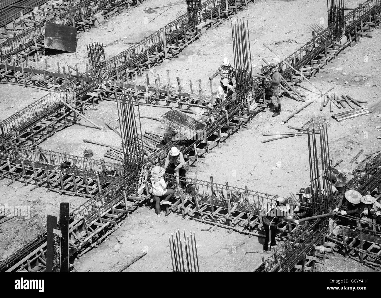 building under construction with workers Stock Photo - Alamy