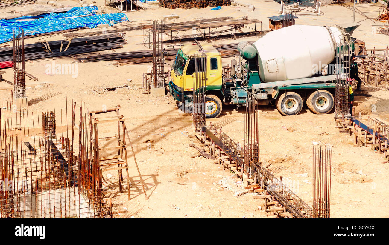 building under construction with workers Stock Photo - Alamy