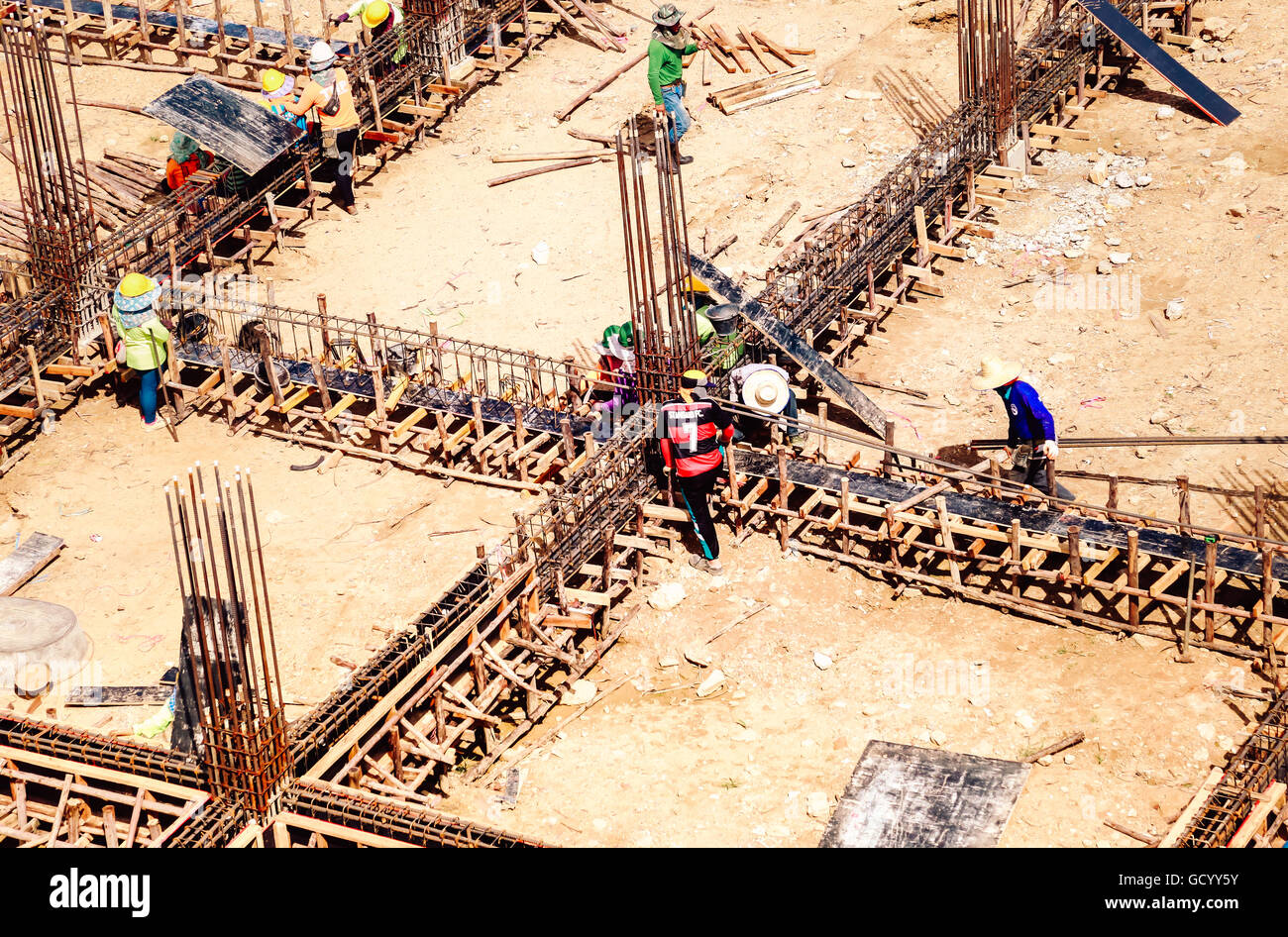 building under construction with workers Stock Photo - Alamy