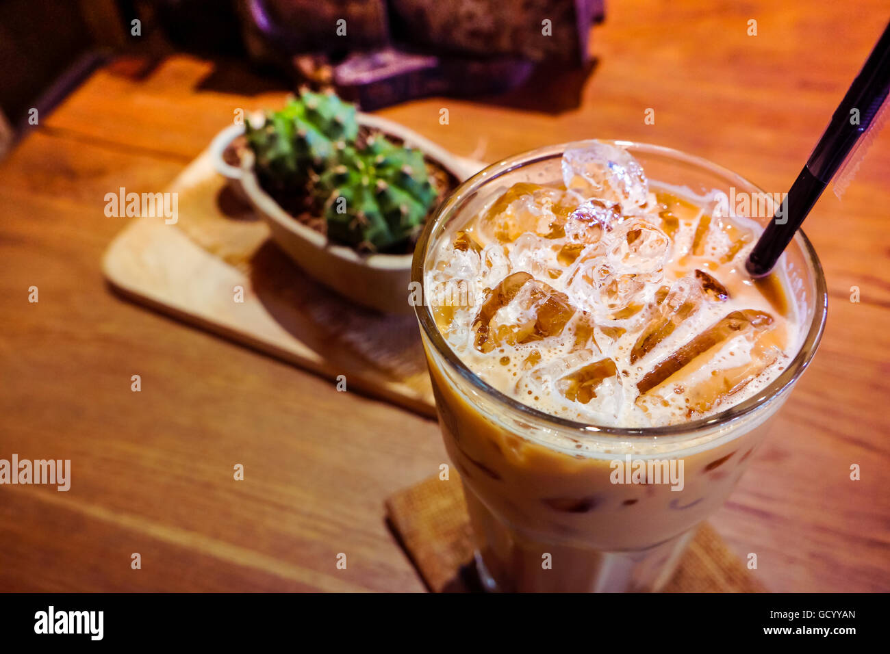 Top view of iced coffee on wooden table Stock Photo - Alamy