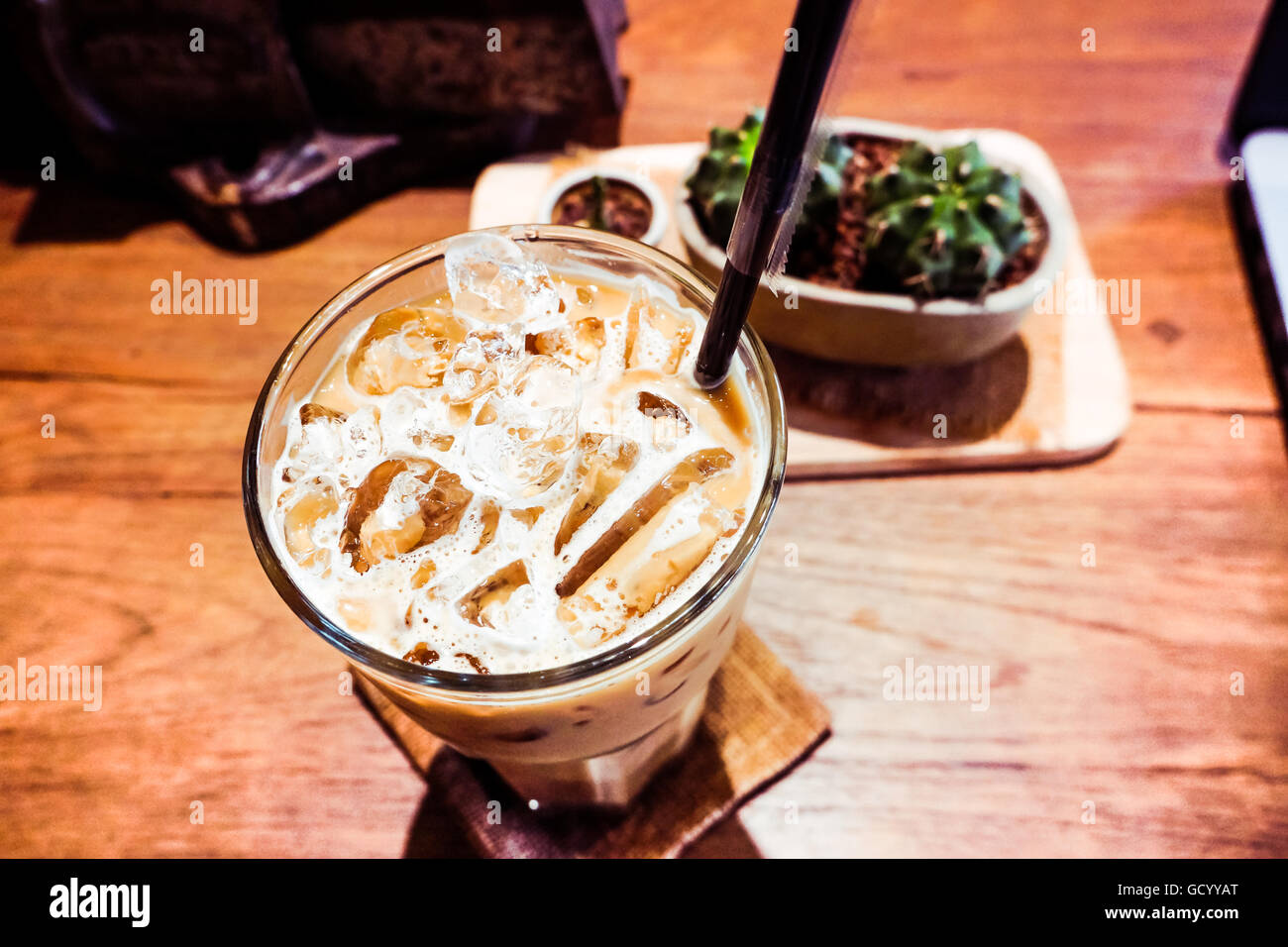 Top view of iced coffee on wooden table Stock Photo - Alamy