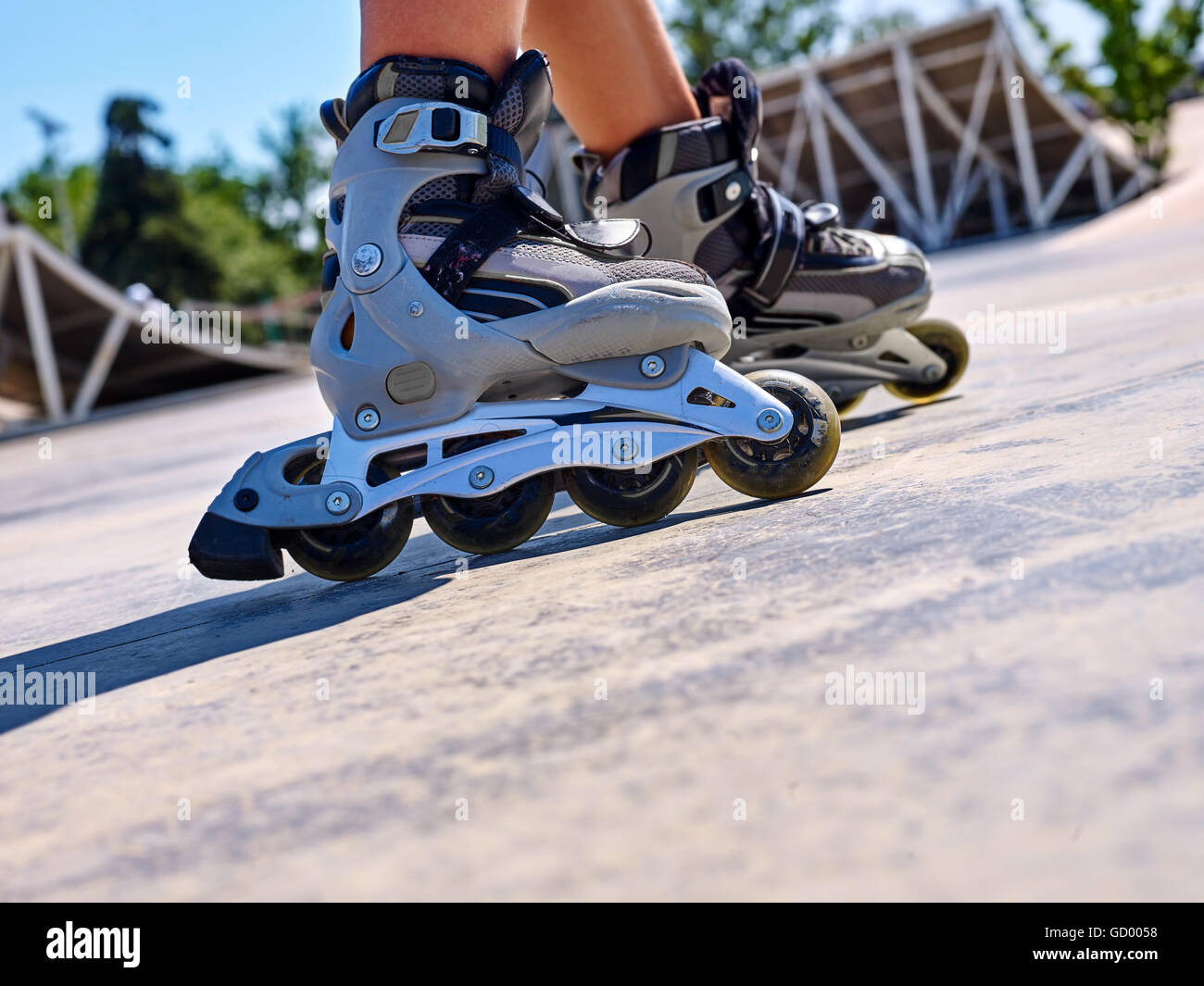Girl riding on roller skates Stock Photo - Alamy