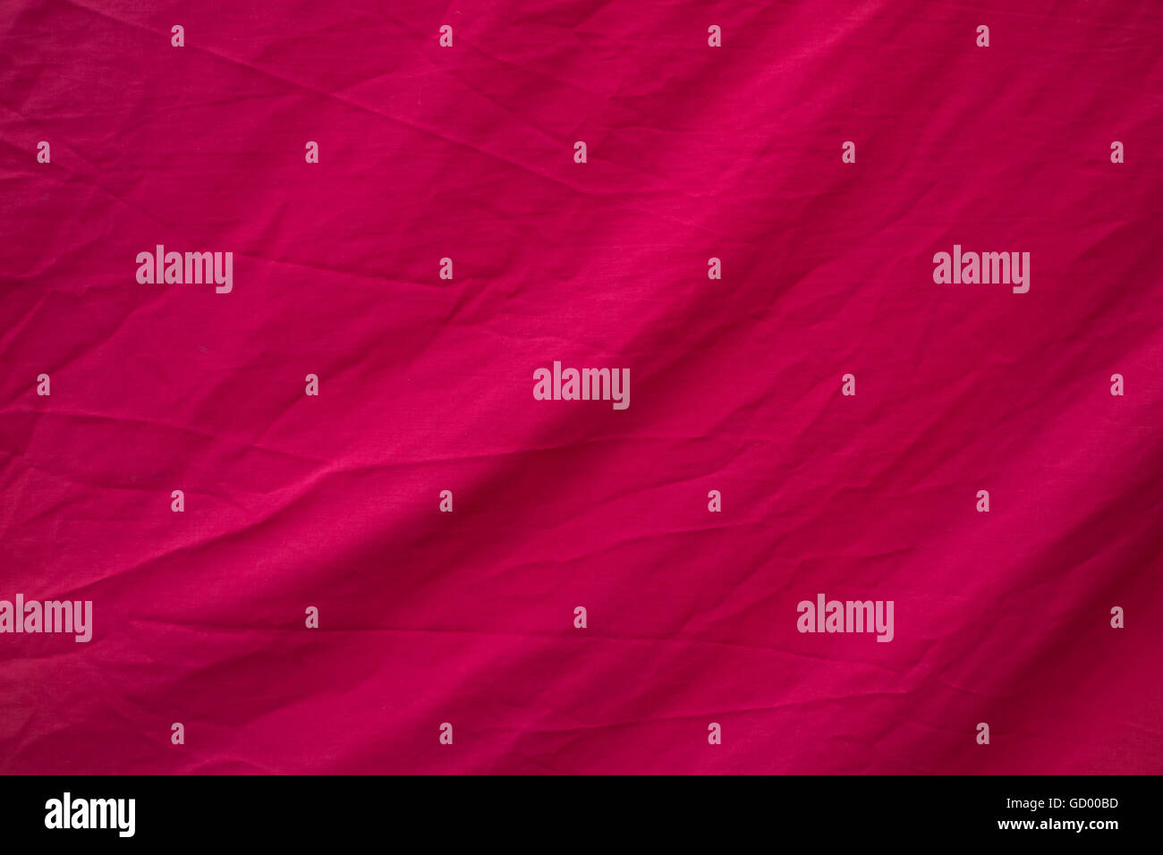 Red sheet with creases on washing line Stock Photo - Alamy