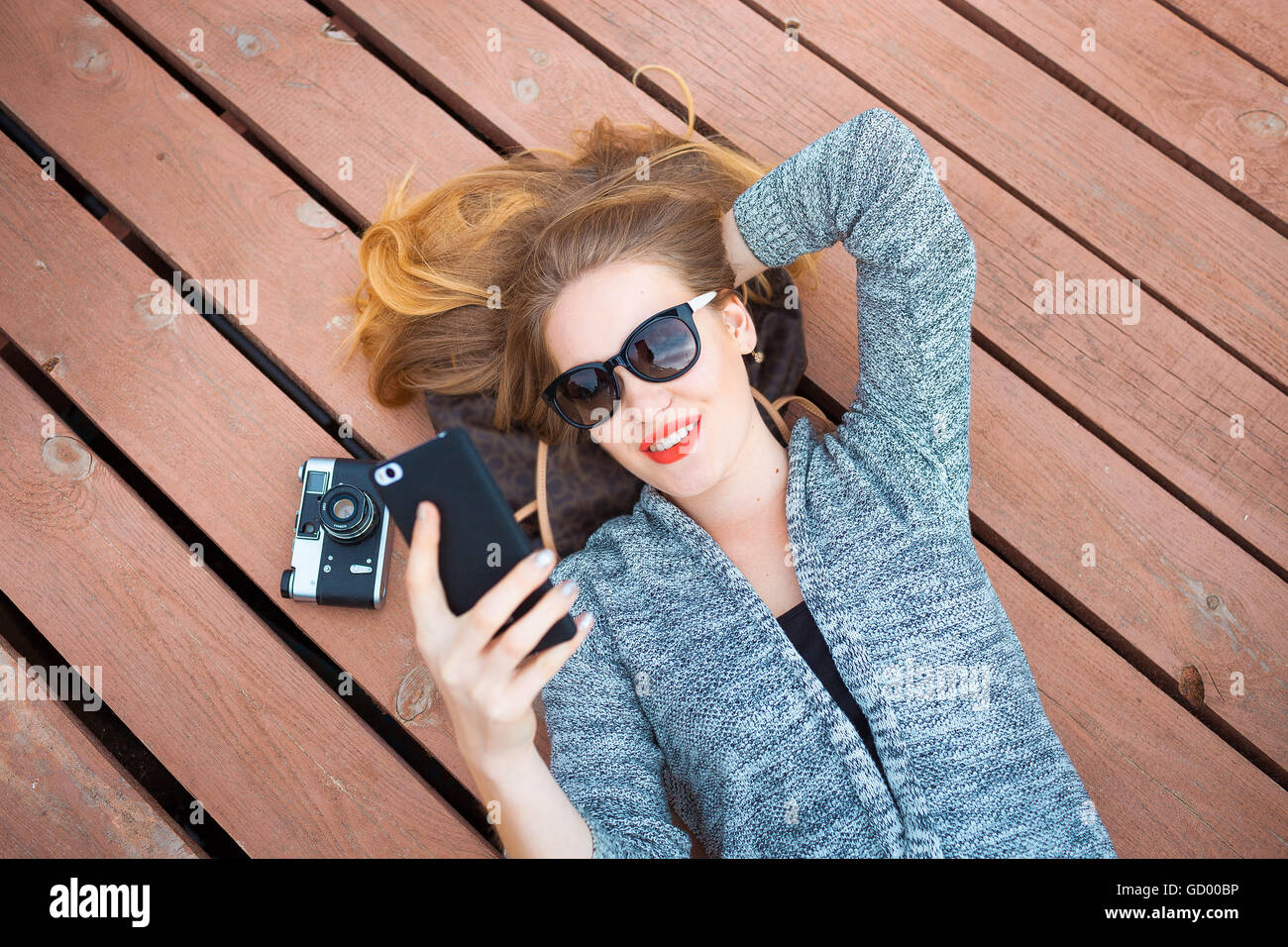 Woman taking pictures cellphone hi-res stock photography and images - Alamy